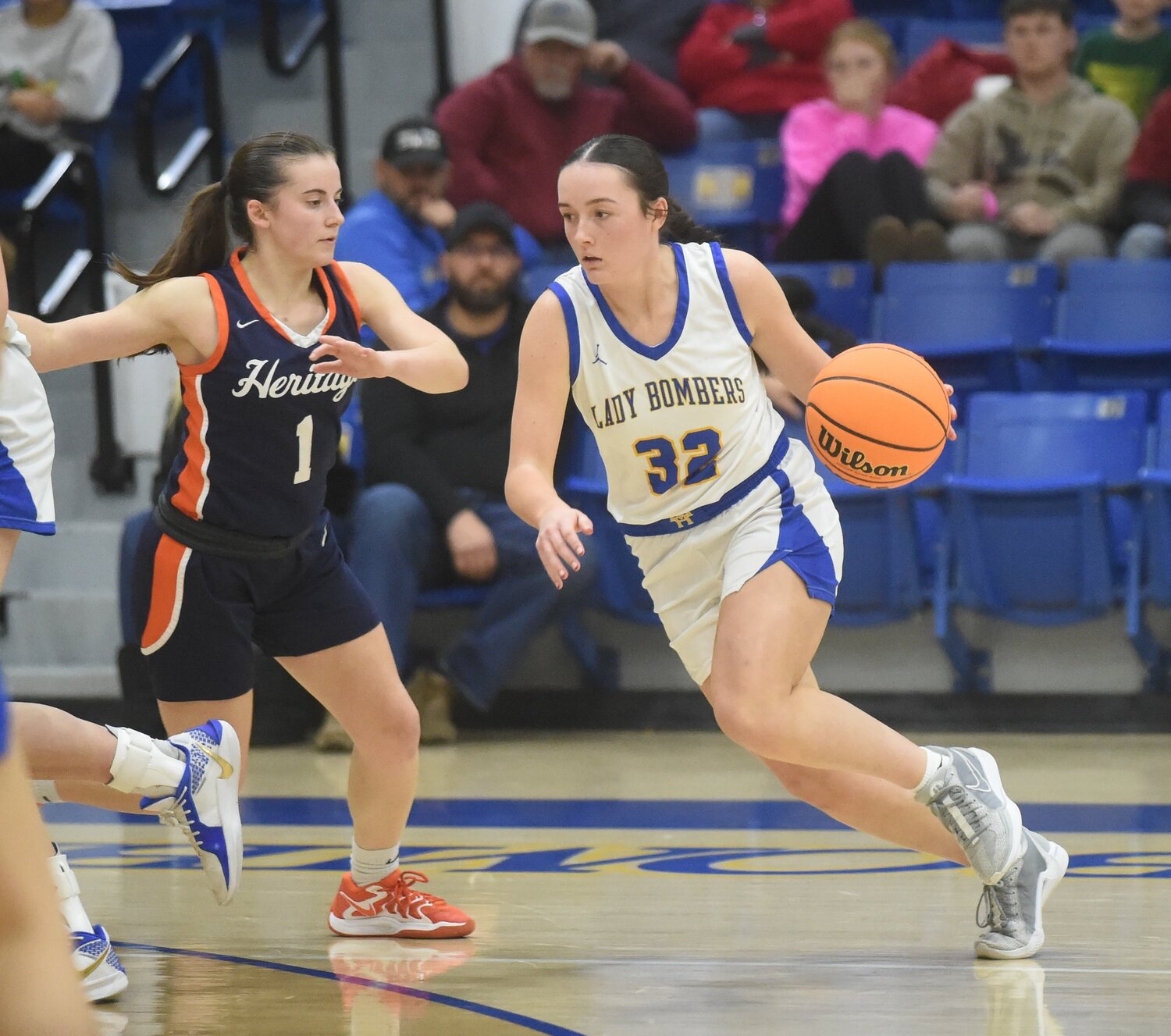 Lady Bombers crush Rogers Heritage, run streak to 8 | Baxter Bulletin