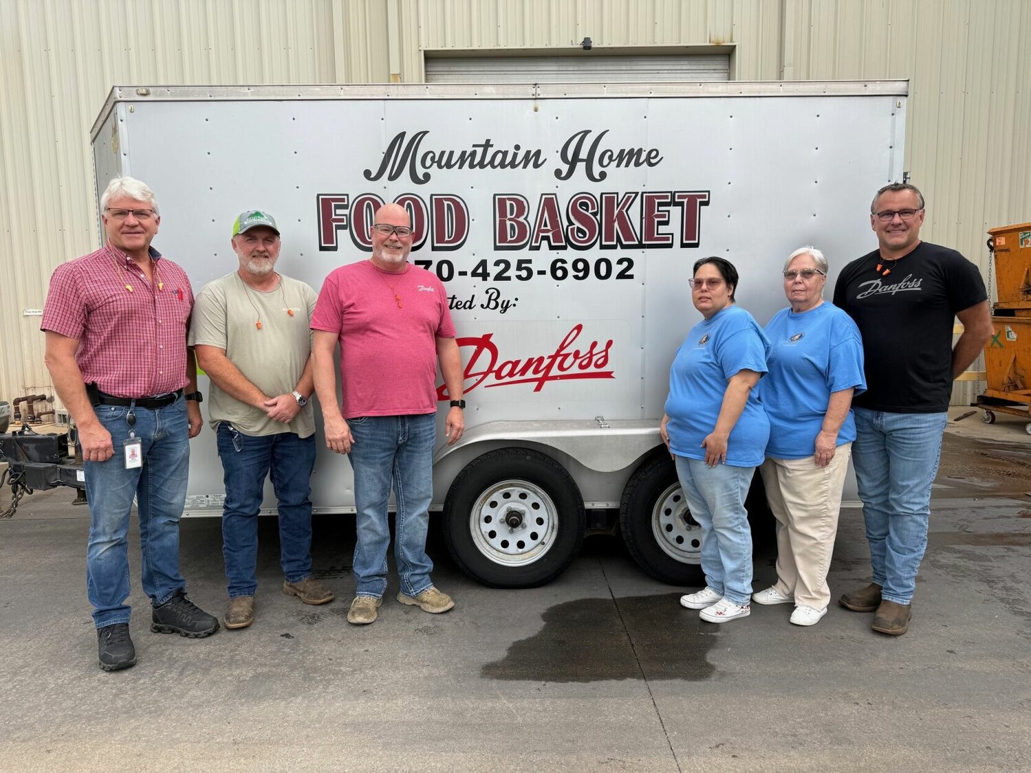 DanFoss donates food to MH Food Basket | Baxter Bulletin
